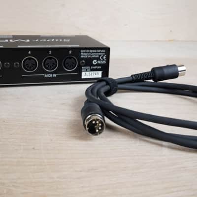 Roland MPU-64 USB MIDI Interface 1998 Black w/ USB Cable, | Reverb