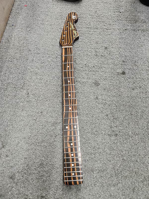 Zebra wood neck - Zebra finish with logo | Reverb
