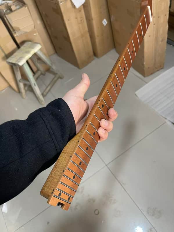 Round head stainless steel 24 frets Headless electric guitar | Reverb