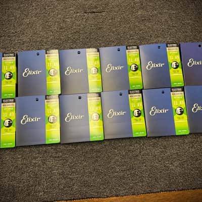 12 Individual Packs of Elixir 19102 Optiweb Nickel Plated | Reverb