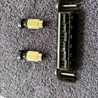 Leo Quan Badass Wraparound Bridge 2026 - Black | Reverb