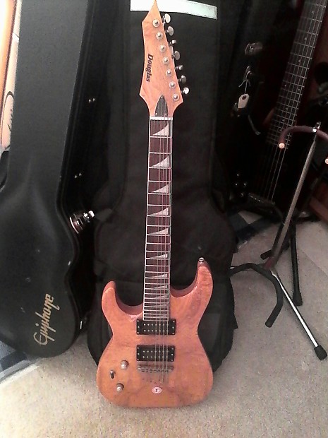 Douglas Lefty 7 string electric guitar Light Wood Finish | Reverb