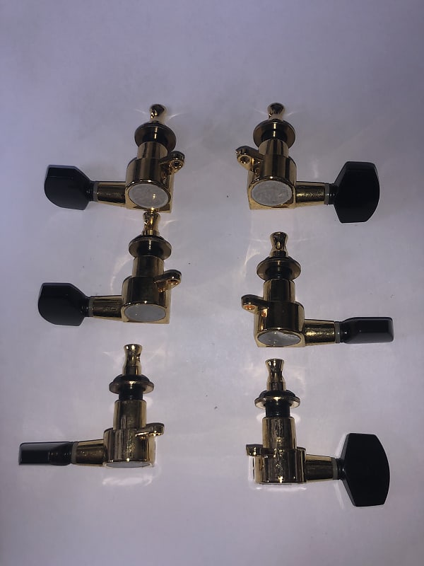 Gold coloured machine heads black button electric / | Reverb UK
