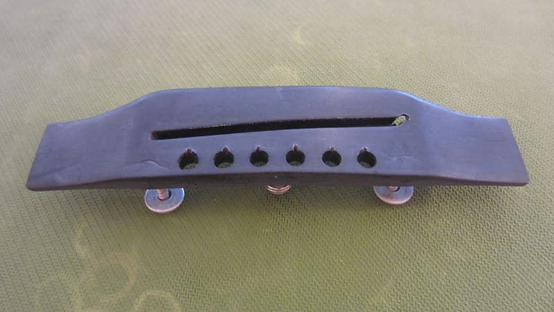 Vintage 1960s Gibson Plastic Acoustic Bridge | Reverb