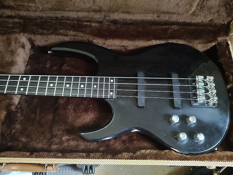 Carvin 4 string left handed bass w/case | Reverb
