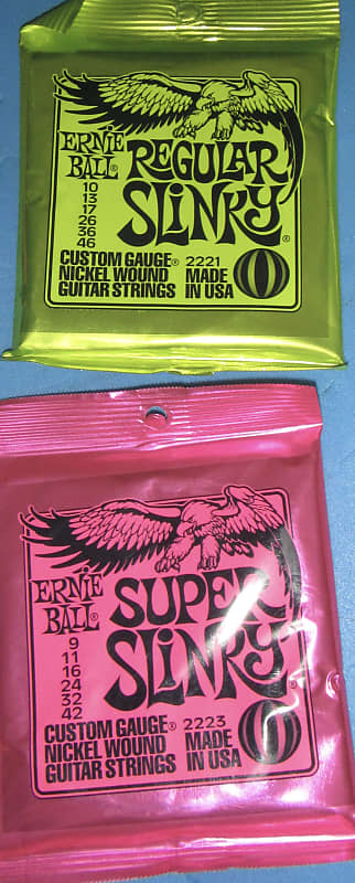 2 sets of Ernie Ball Regular and Super Slinky guitar strings | Reverb