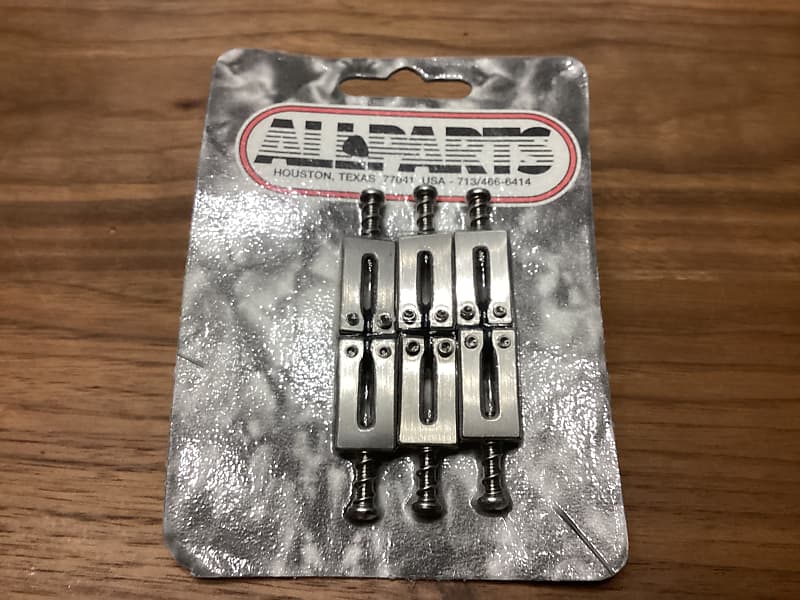 Graph Tech Ferraglide saddles for Strat - Brushed steel | Reverb