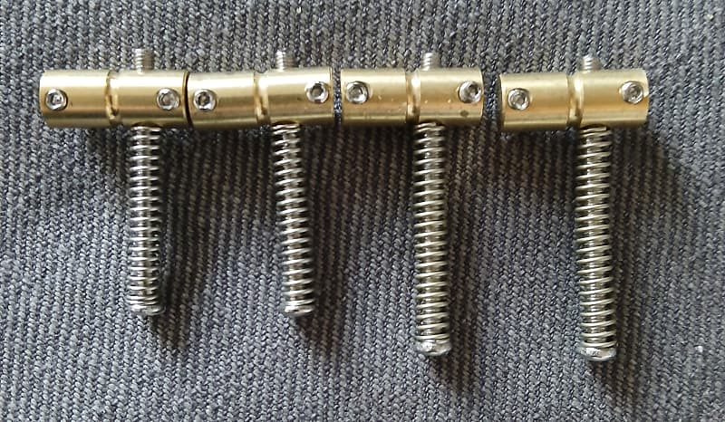 Wilkinson P Bass Brass Bridge Saddles 2024 - Brass | Reverb