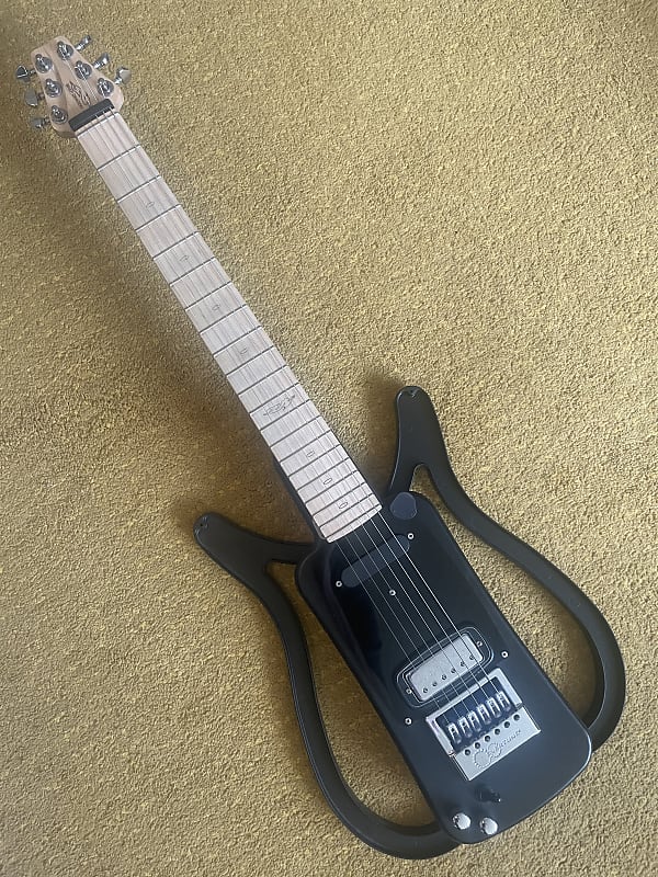 Left Handed Snapdragon Folding travel guitar with Evertune | Reverb