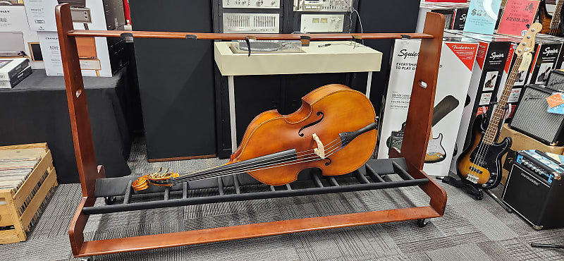 Cello rack stand with wheels in very good condition | Reverb