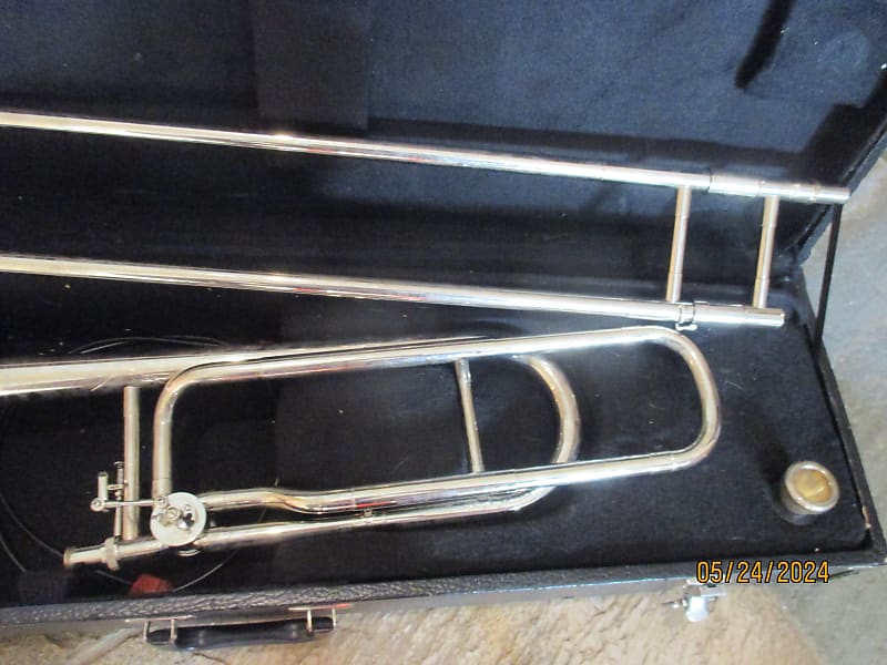 Silver trigger trombone with case and mouthpiece, Open wrap. | Reverb