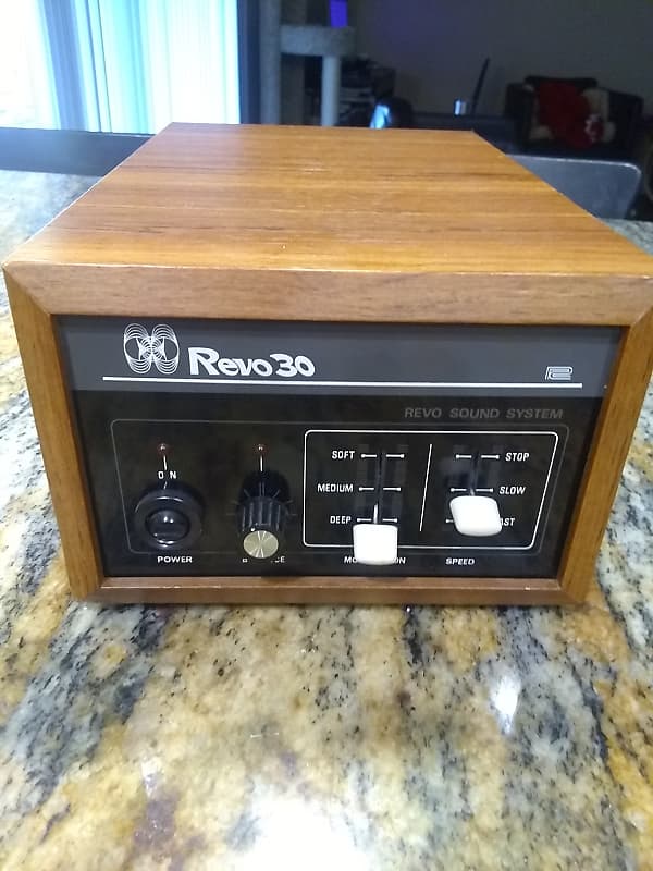 Roland Revo 30 1970s wood grain | Reverb