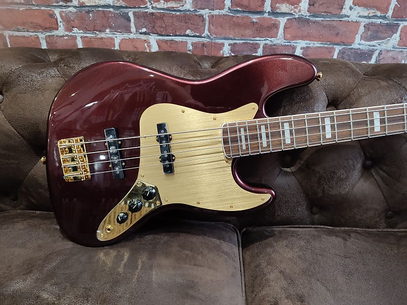 Squier 40th Anniversary Gold Edition Jazz Bass Ruby Red | Reverb