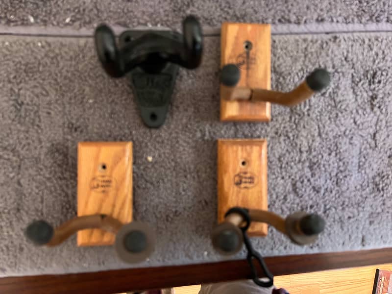 Guitar Hangers 3 String Swings and 1 Off The Wall | Reverb