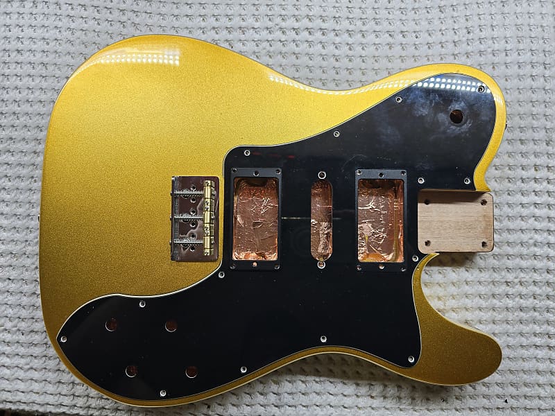 TELE DELUXE DELUXE - GOLD WITH CREAM BINDING | Reverb