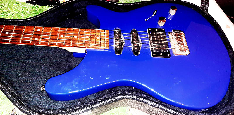 Rogue Rocketeer navy blue strat-style double cutaway guitar | Reverb