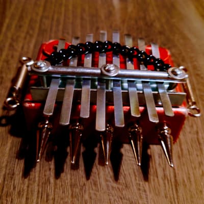 kalimba/noise box/percussion/noise instrument/metal | Reverb