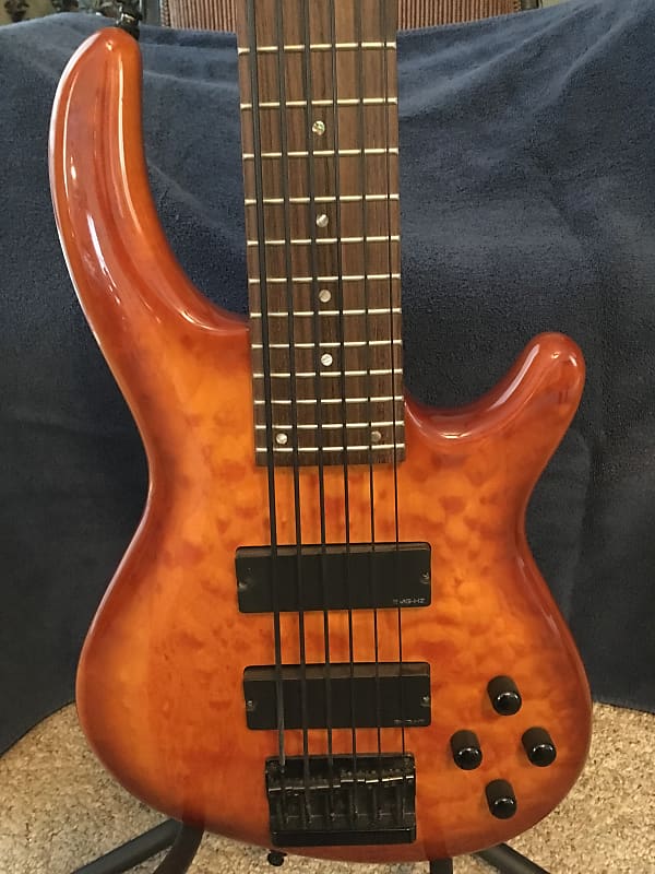 1999 Dean Q6 Six String Bass Quilted Amber | Reverb