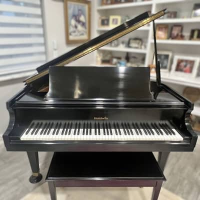 Baldwin Upright Piano Euro Style in American Walnut Finish Baldwin Upright Piano Euro Style in American Walnut Finish