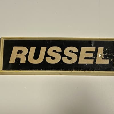 Russel Logo plastic badge | Reverb