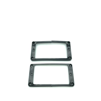 Gibson style black and creme pickup rings with two les paul | Reverb