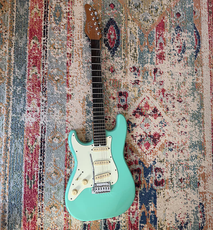 Schecter Nick Johnston Traditional SSS Atomic Green Left | Reverb