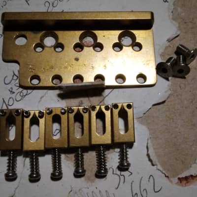 Base plate Fender Stratocaster tremolo + saddle . brass | Reverb