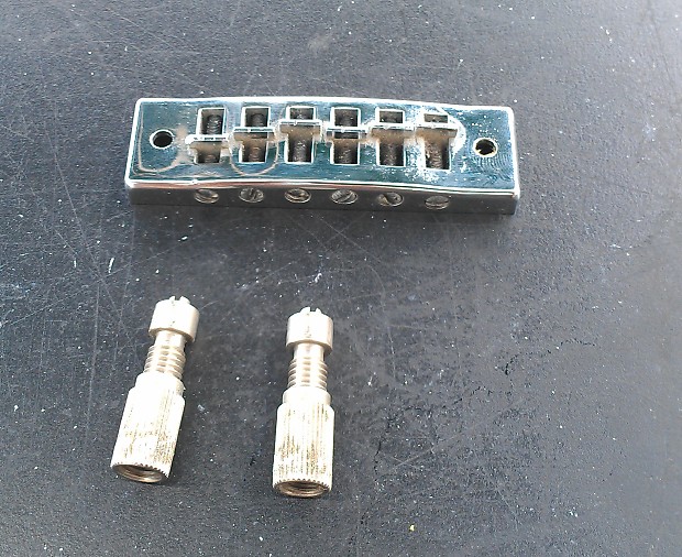Vintage Gibson Harmonica bridge w/studs and bushings | Reverb Canada