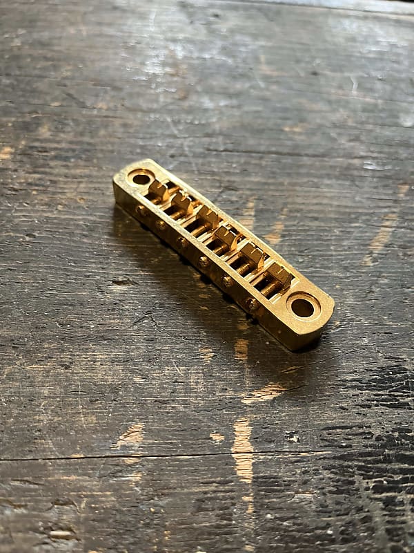 Epiphone bridge for Sheraton 90's - GOLD | Reverb