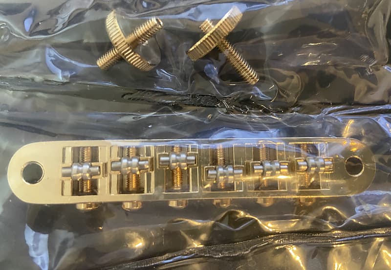 Custom Musical Instruments ABR-1 GOLD roller saddle bridge | Reverb