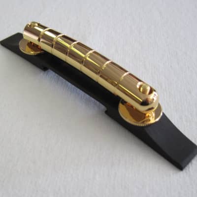 Gretsch Gold Rocking Bar Bridge Assy with Ebony Base | Reverb