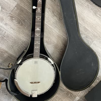 SAMICK banjos, koto, mandolins, zither, acoustic guitars, bass guitars ...