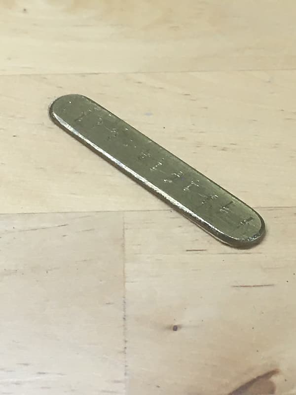 One Solid Mass Brass Vintage Strat Under Strings Saddles | Reverb