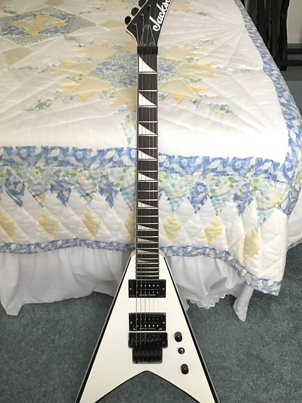 Jackson Flying V White with black bevels | Reverb
