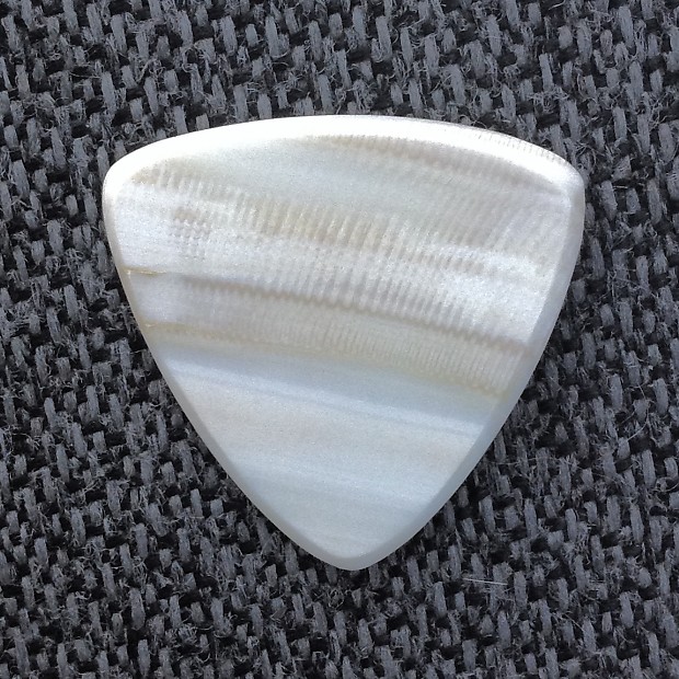 Real seashell guitar pick- 2.5mm thick. Curved edge triangle. | Reverb