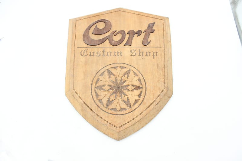 Cort Custom Shop Wooden Guitar Sign from Cort Guitars Custom | Reverb