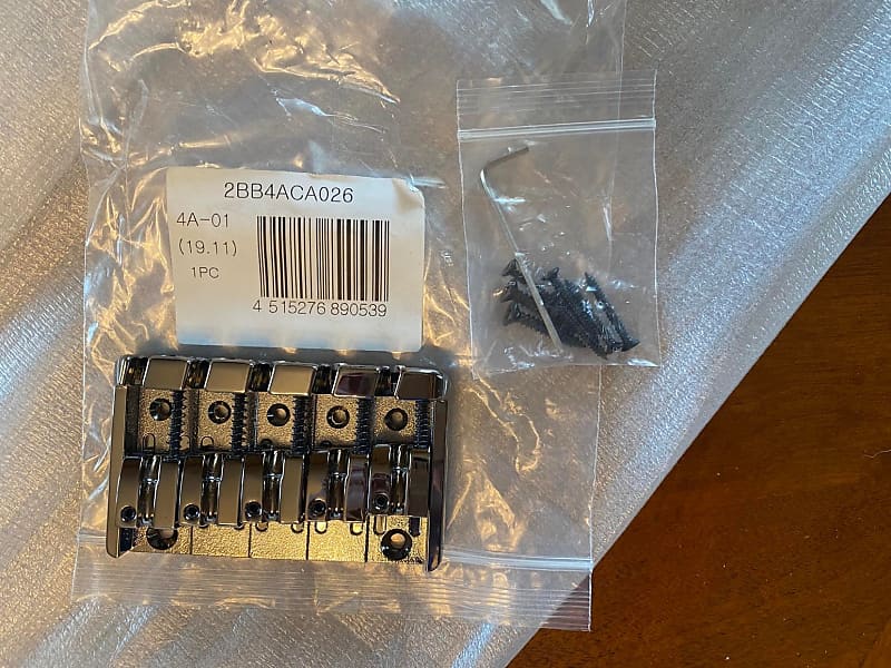 Genuine Ibanez 2BB4ACA026 Cosmo Black Finish Bridge for B305 | Reverb