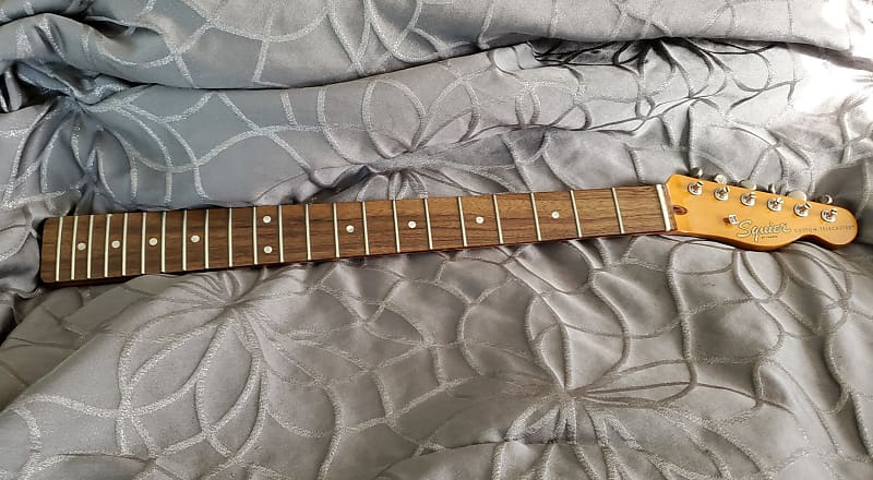 Squier baritone telecaster neck loaded - vintage tinted | Reverb