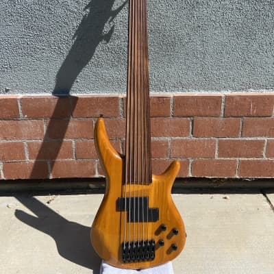 Raven West 7 String Wide Fret Bass blonde thru neck body 18 | Reverb