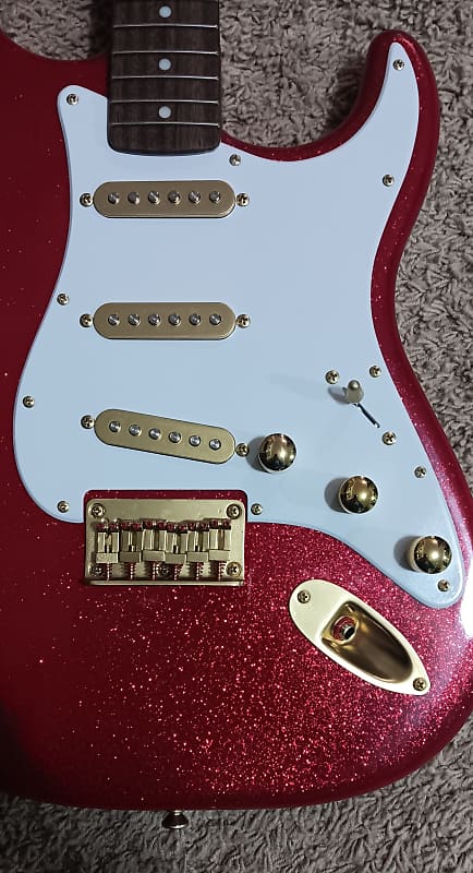 Squier Stratocaster - Red Sparkle | Reverb