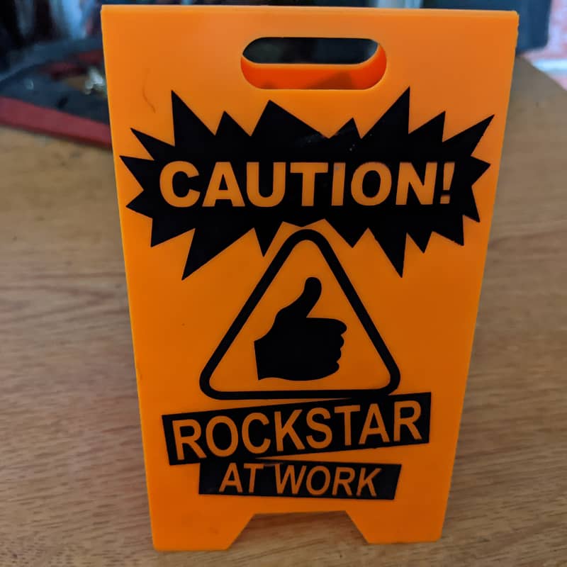 Rockstar At Work Mini Caution Sign 5"x3" 2010s Orange / Black | Reverb