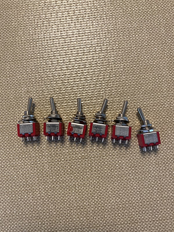 LR On-On—-2 way switch 2020 Red and silver- plastic and | Reverb
