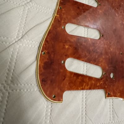 Spitfire aged orange tortoiseshell stratocaster pickguard | Reverb