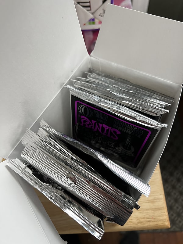 Ernie Ball 10 pack box! 3120 Coated Titanium Power Slinky | Reverb