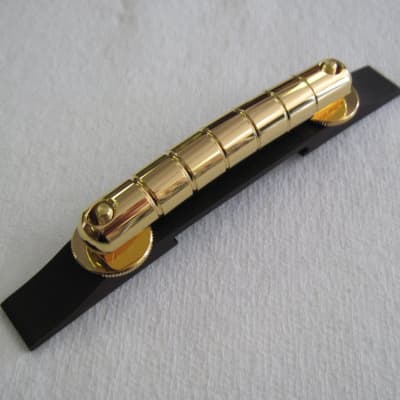 Gretsch Gold Rocking Bar Bridge Assy with Ebony Base | Reverb