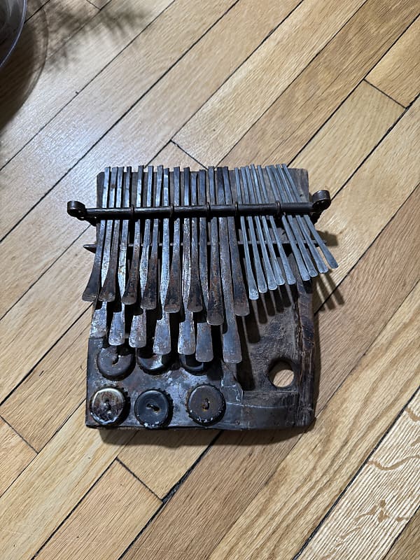 Unknown Kalimba with Bottlecap percussive element | Reverb