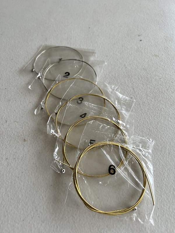 Unknown Bronze acoustic guitar light string set | Reverb