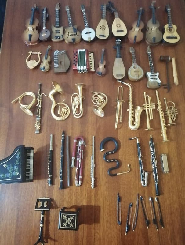 Collection of miniature musical instruments Musical | Reverb