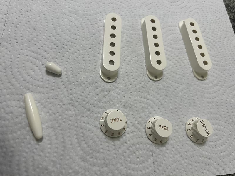 Fender Strat knobs and pickup covers. White | Reverb Fender Strat knobs and pickup covers. White | Reverb