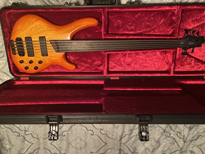 Cort Bass / fretless Cort B5F1 ? Flame orange | Reverb